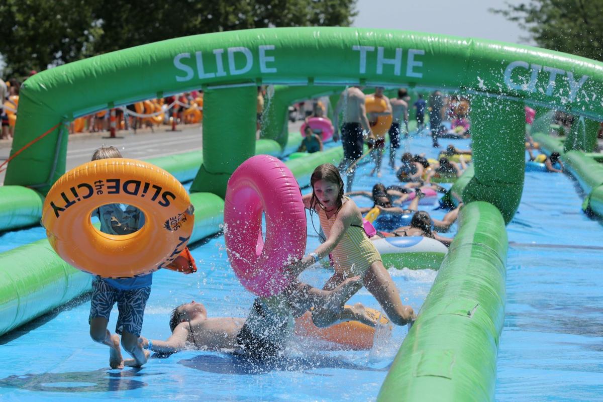 Slide the City turns Oakland Avenue into giant water slide | Metro ...