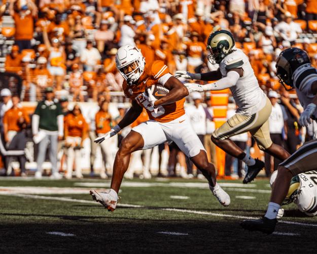 Two St. Louisans featured in marquee Texas-Michigan college football clash