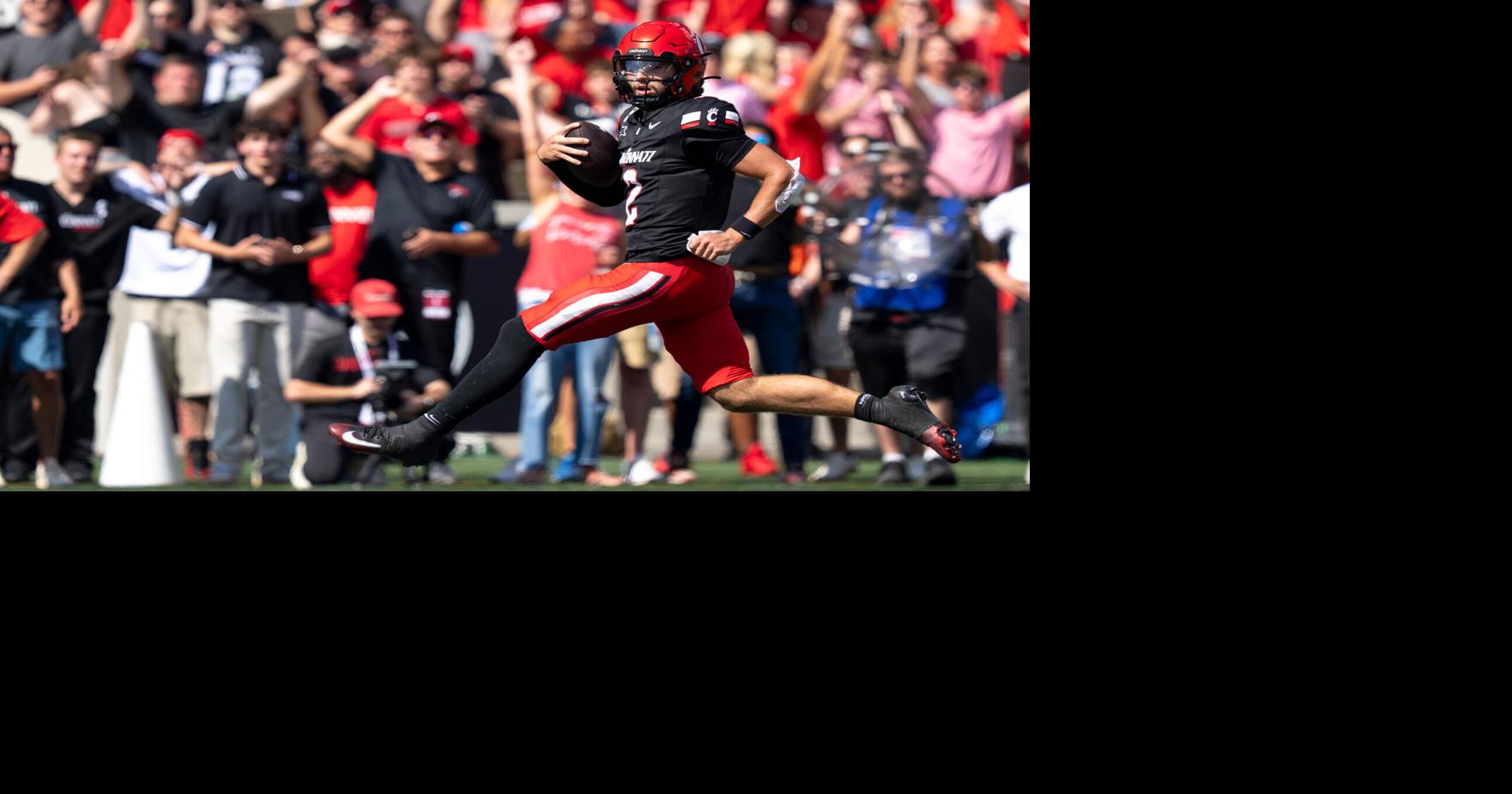 Cincinnati Bearcats quarterback Brendan Sorsby (2) scores a touchdown ...
