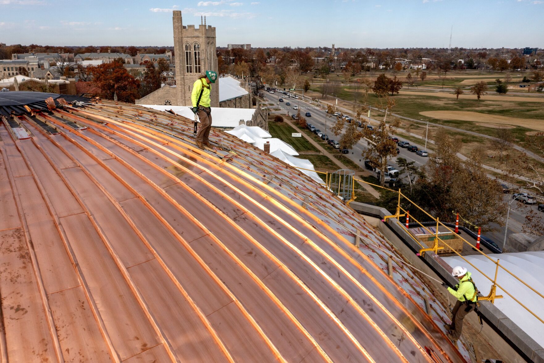 Tornado-damaged dome gets new copper lid in St. Louis