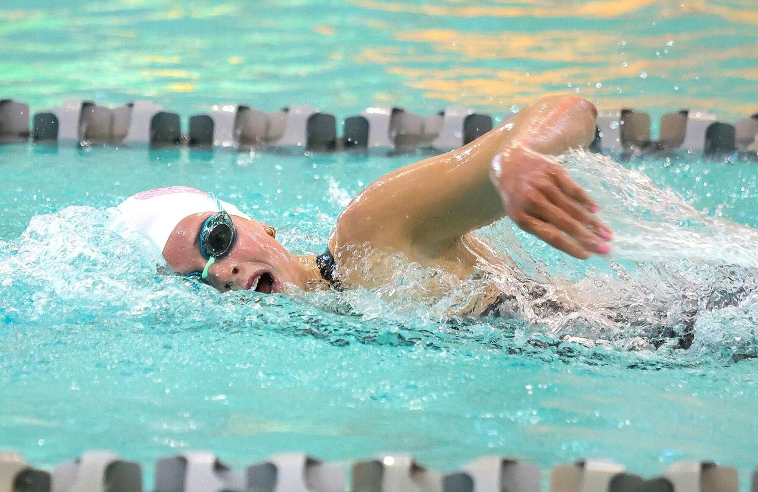 Scenes from the Class 1 girls swimming and diving state meet