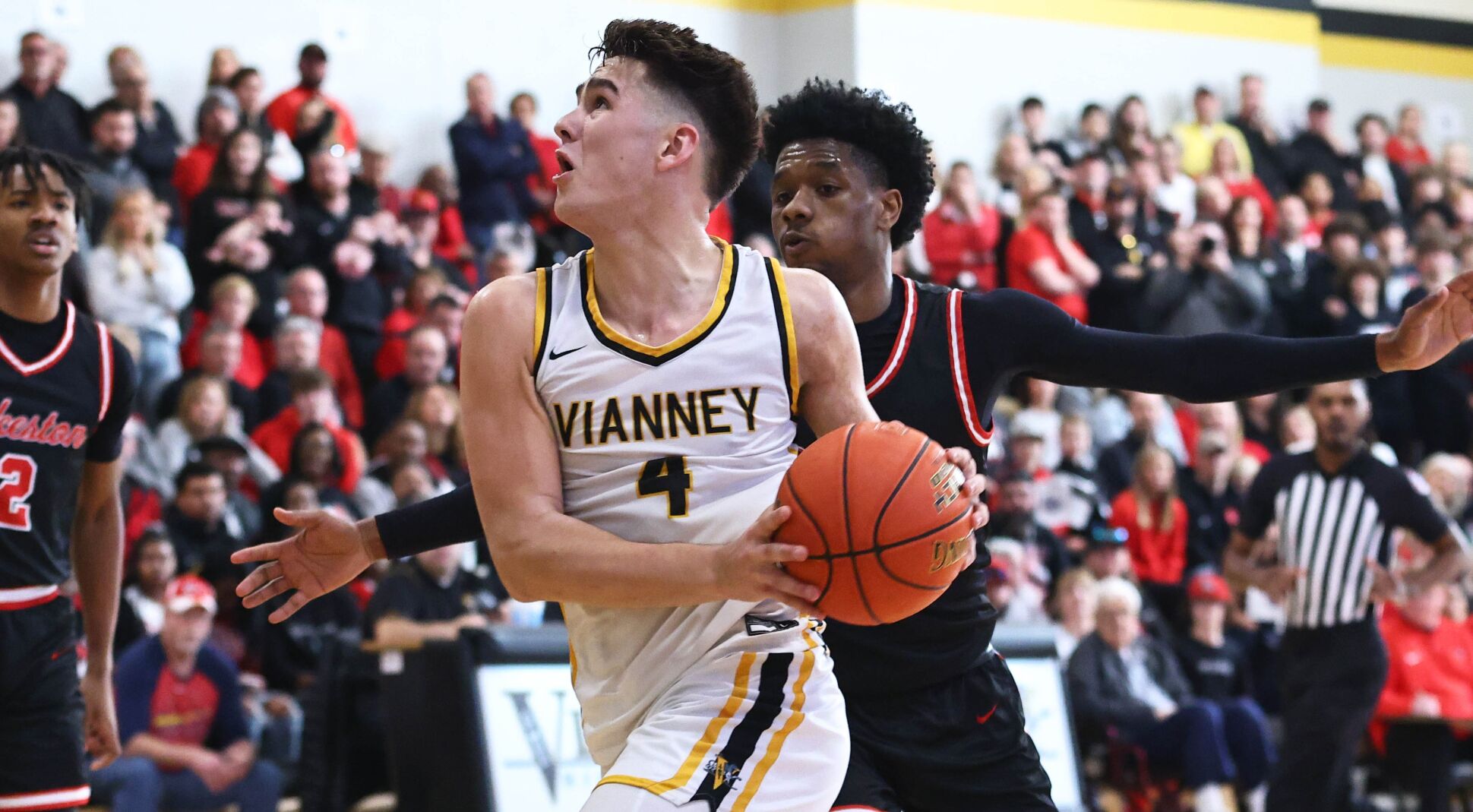 Vianney cuts down its own nets after surging past Sikeston in Class 5 ...