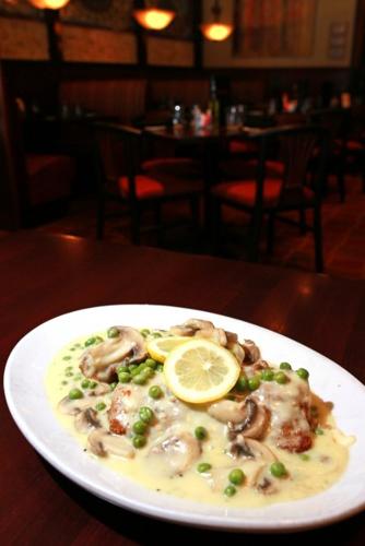 Cheese-sauced cod is a favorite at Bill Gianino's