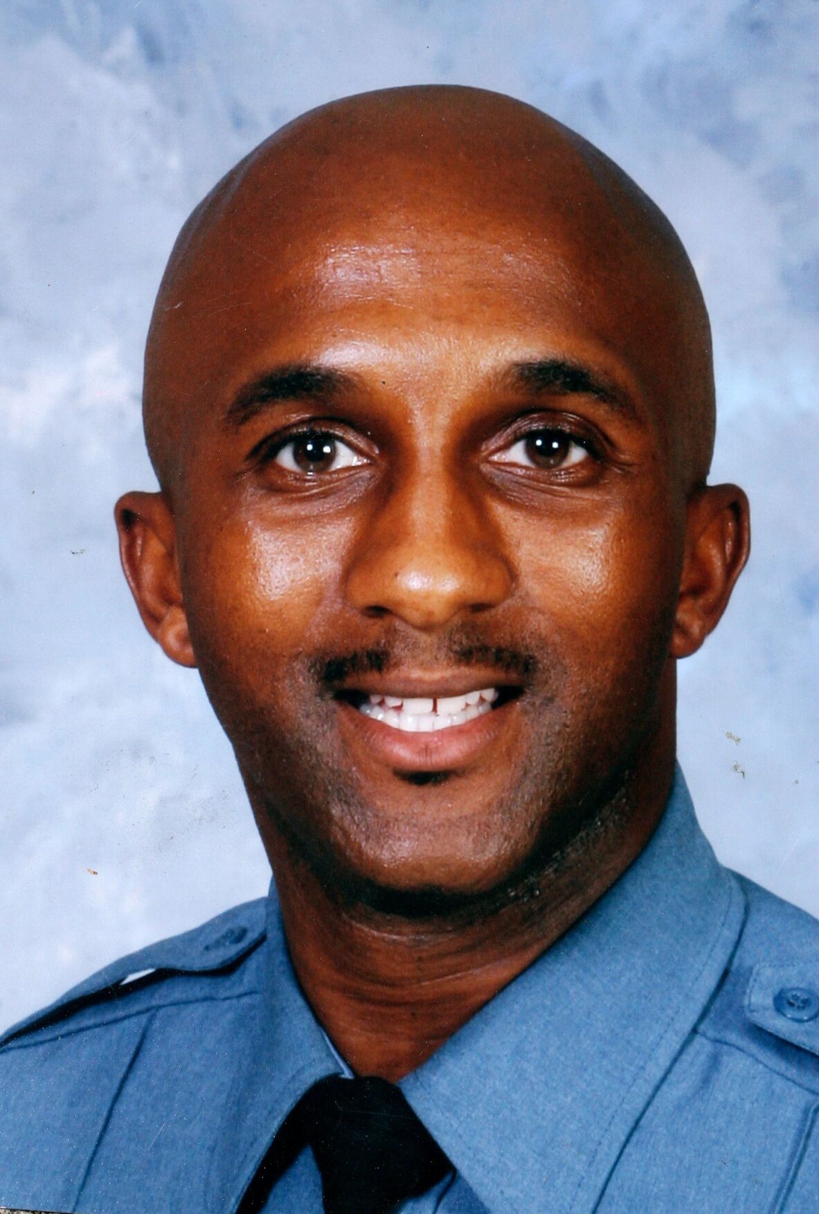 Man charged with killing St. Louis area campus cop in 2008