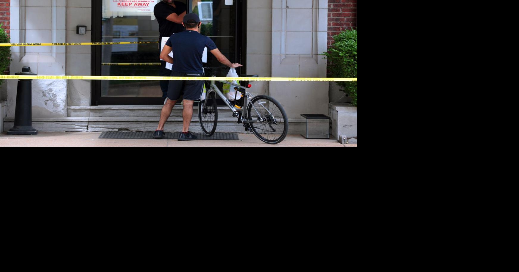 Bricks fall from St. Louis apartment building as part of structure bows ...
