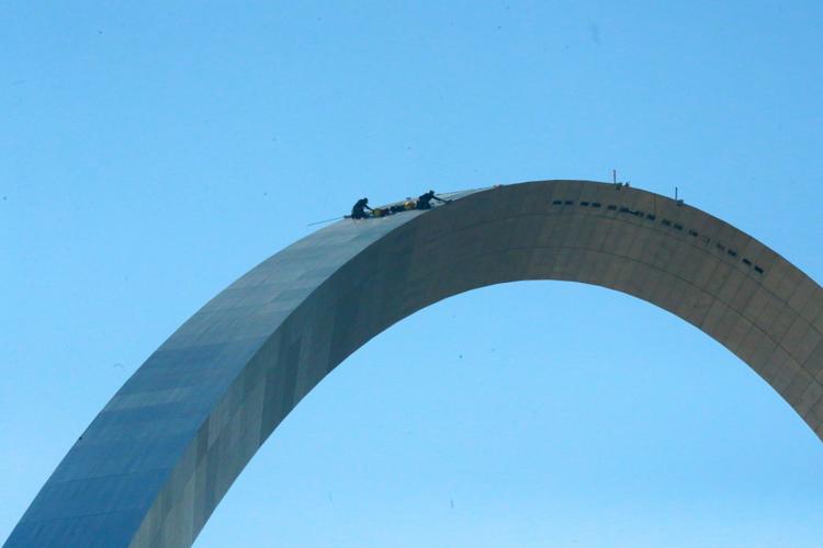 Workers rappel Arch, sample stains on monument surface