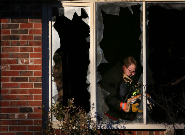 Photo: Picking up the pieces after St. Louis County fire