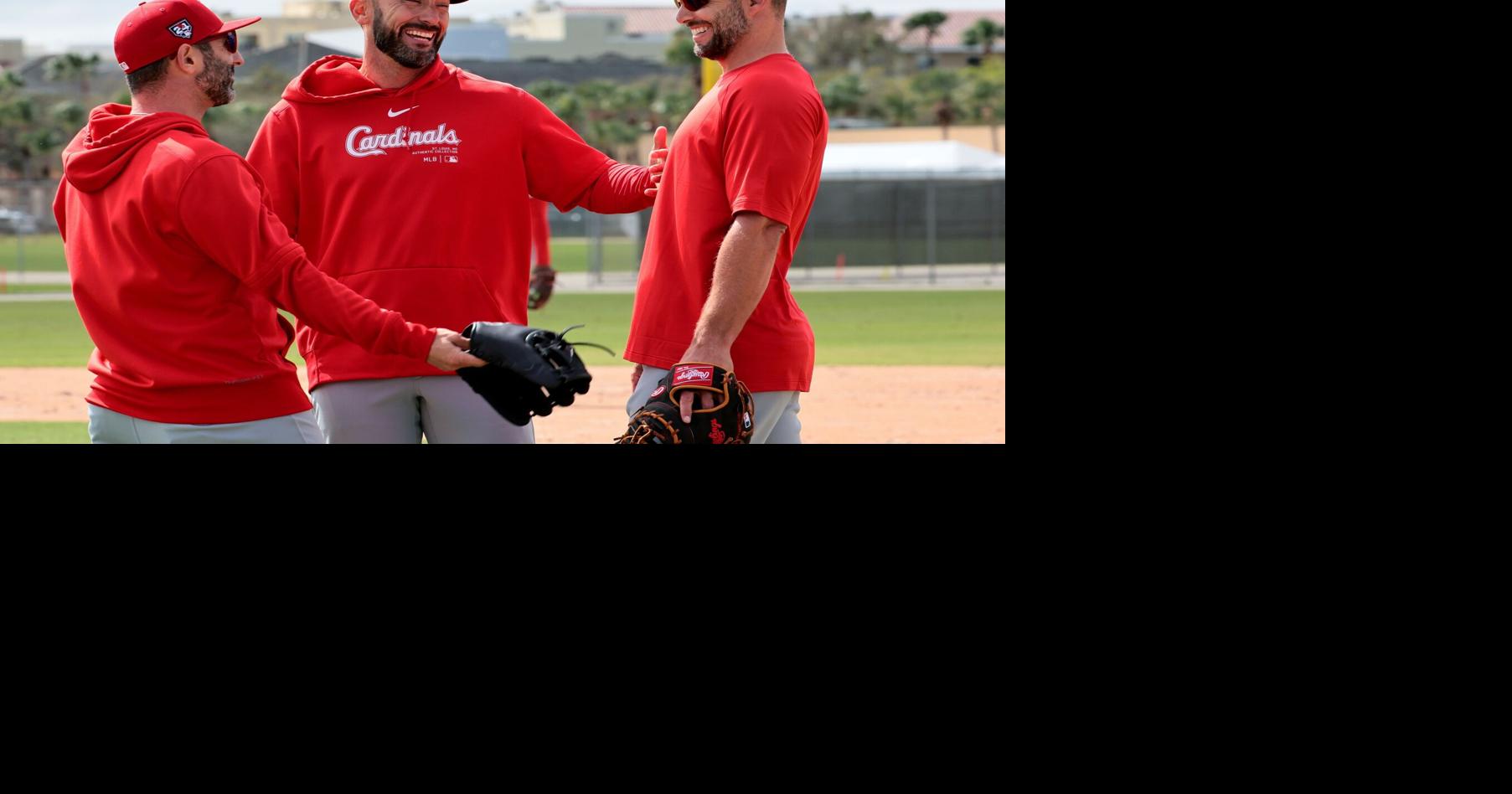 Full squad reports, first team meeting held at Cardinals spring training