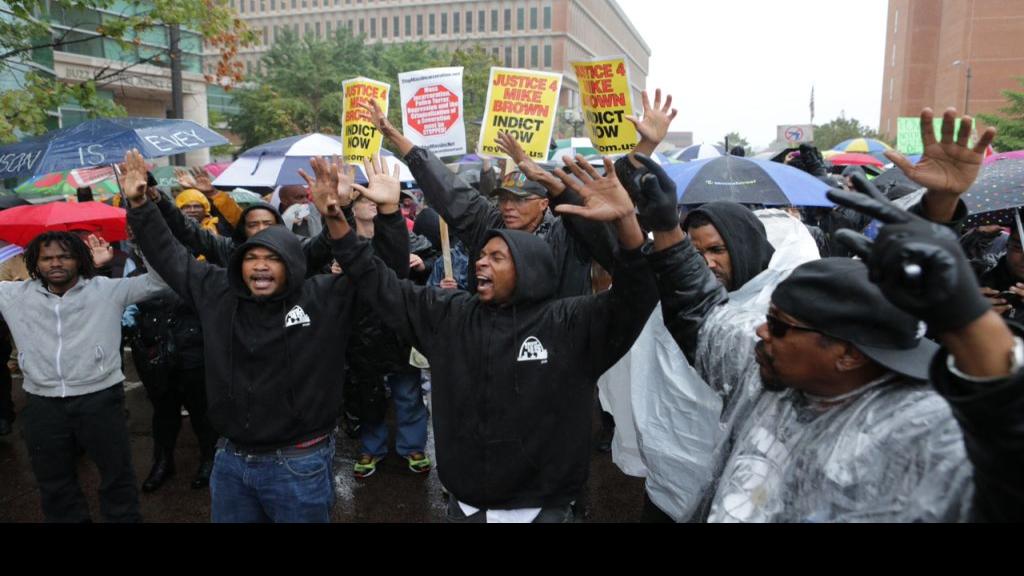 Michael Brown demonstrators march on Clayton | Videos | stltoday.com