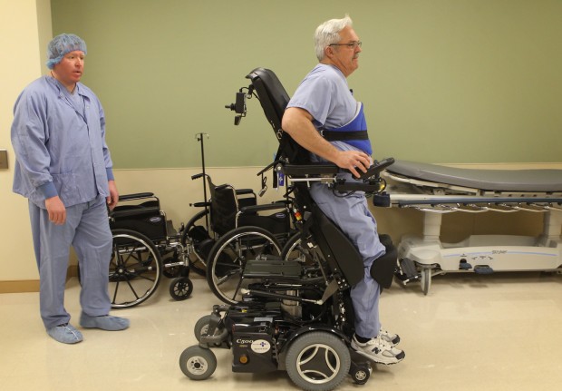 Paralyzed surgeon stands up for his patients