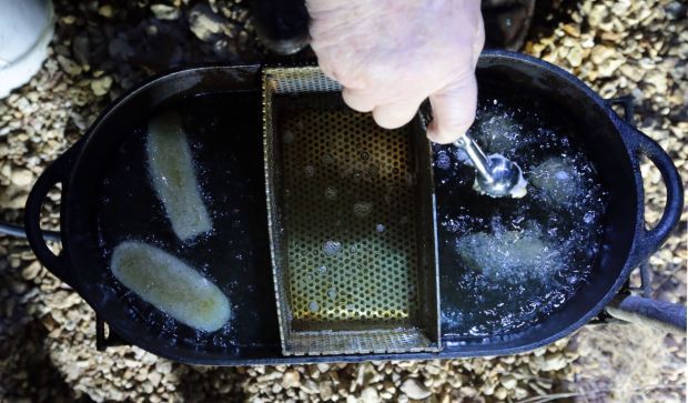 A primitive method still snags sucker fish on Missouri's Current River