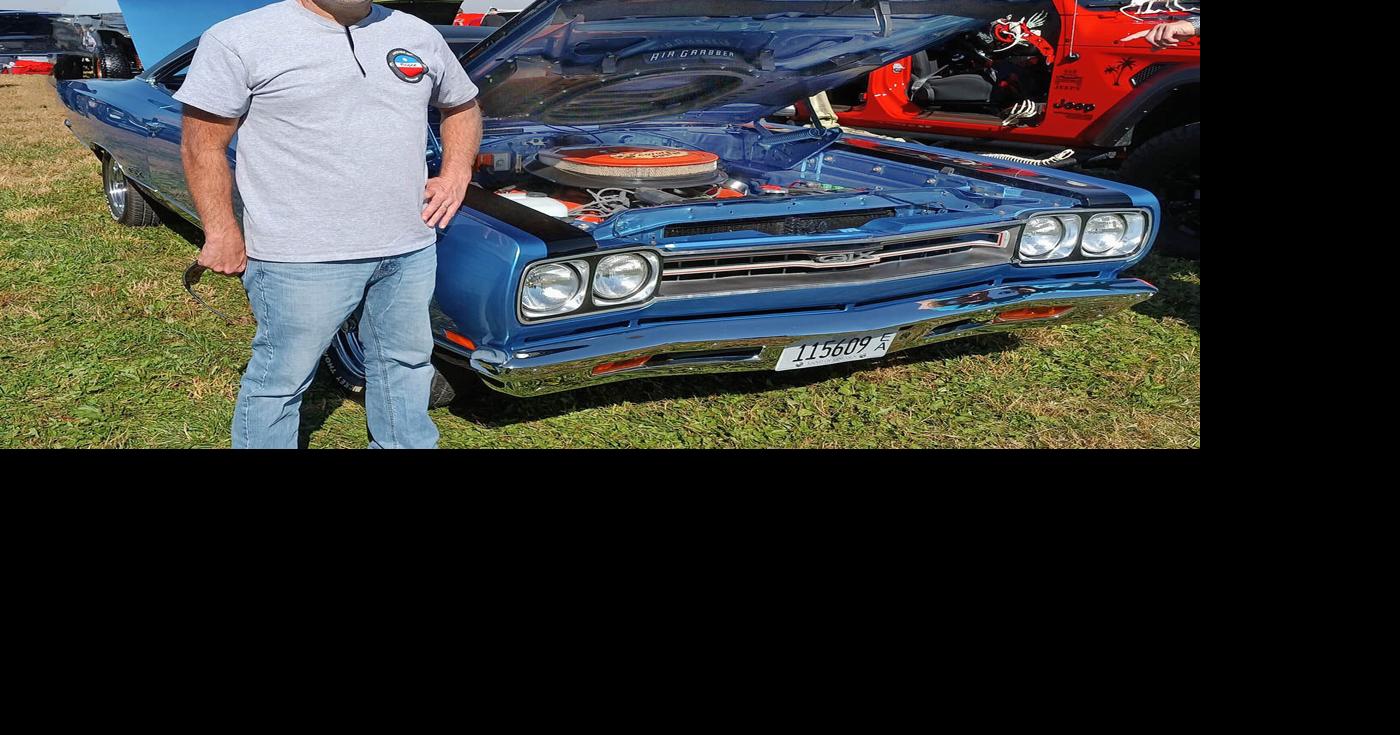 Belleville couple showed off their favorite cars at Grizzlies Ballpark