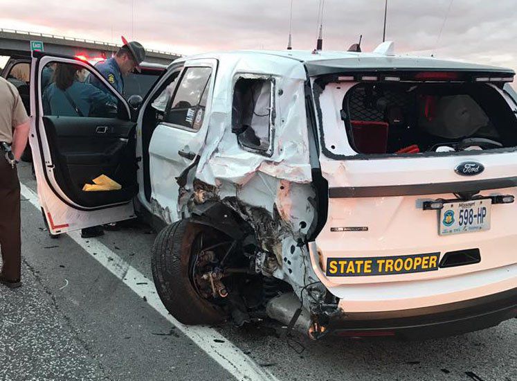 Two state troopers injured when tractor trailer hits their vehicle ...