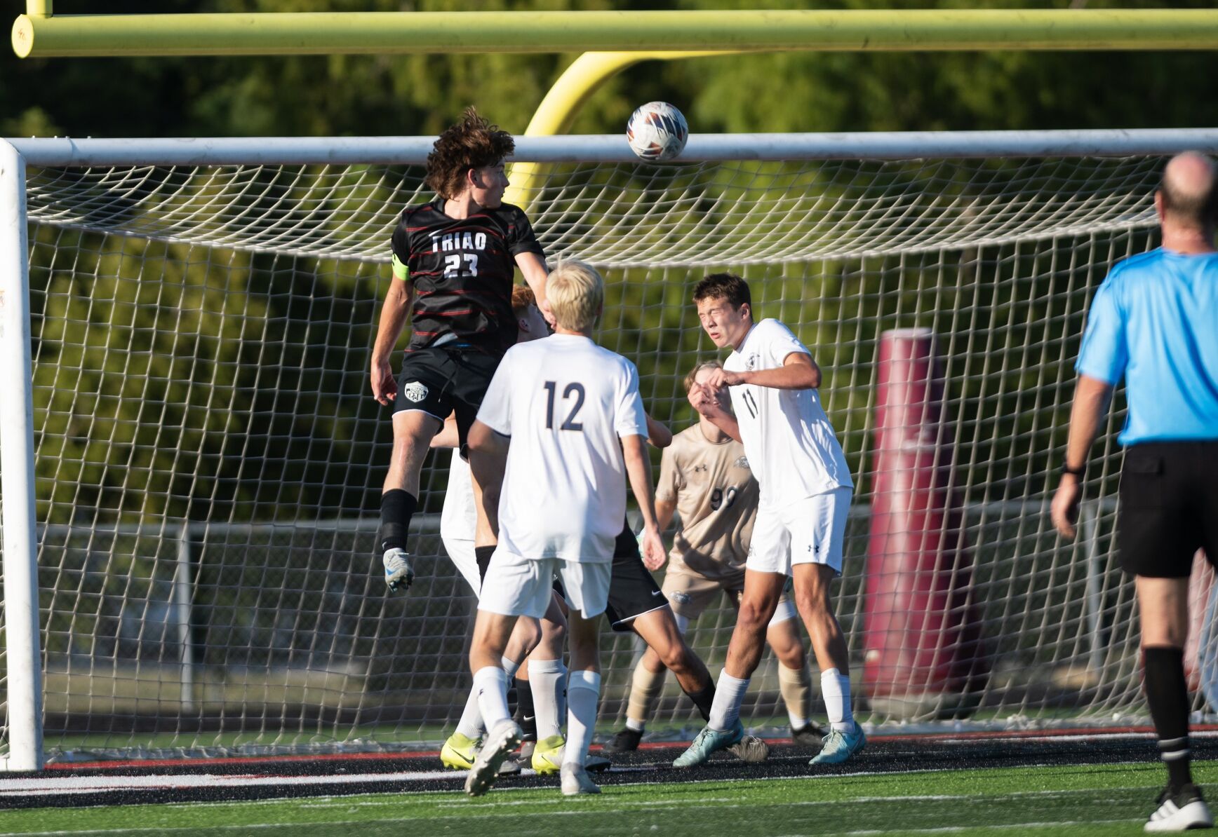 Triad 2, Father McGivney 0