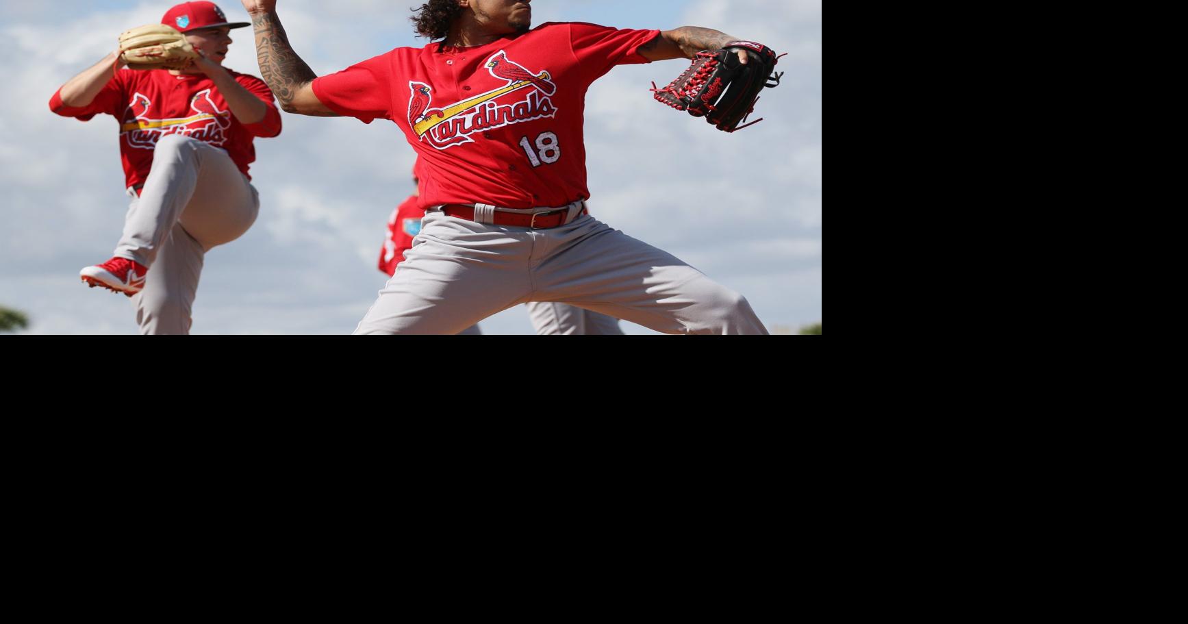 Photos: Cardinals open camp with pitchers throwing first bullpen session