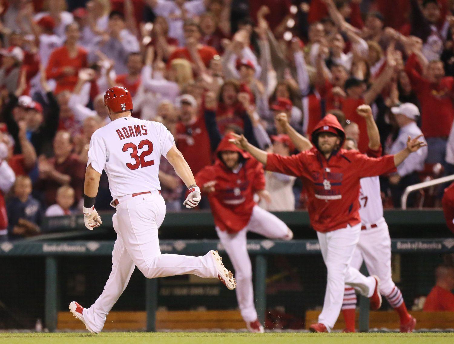 Cards win on Adams' single in 10th