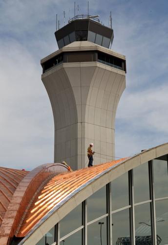 Main Lambert terminal gets shiny, new roof