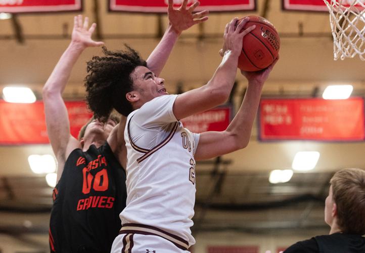 Iziah Purvey helps power Webster Groves past De Smet for Coaches vs ...