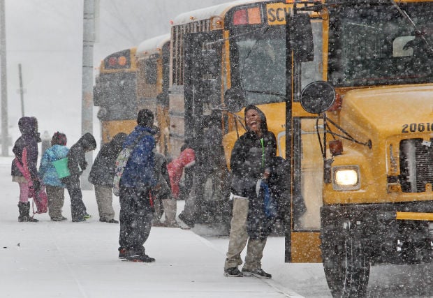 More snow overnight slows roads, closes schools across St. Louis