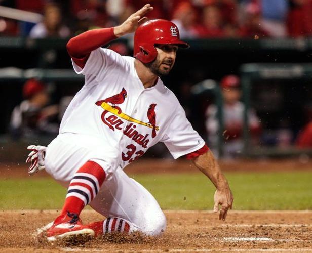 Cards add reliever, let Descalso depart