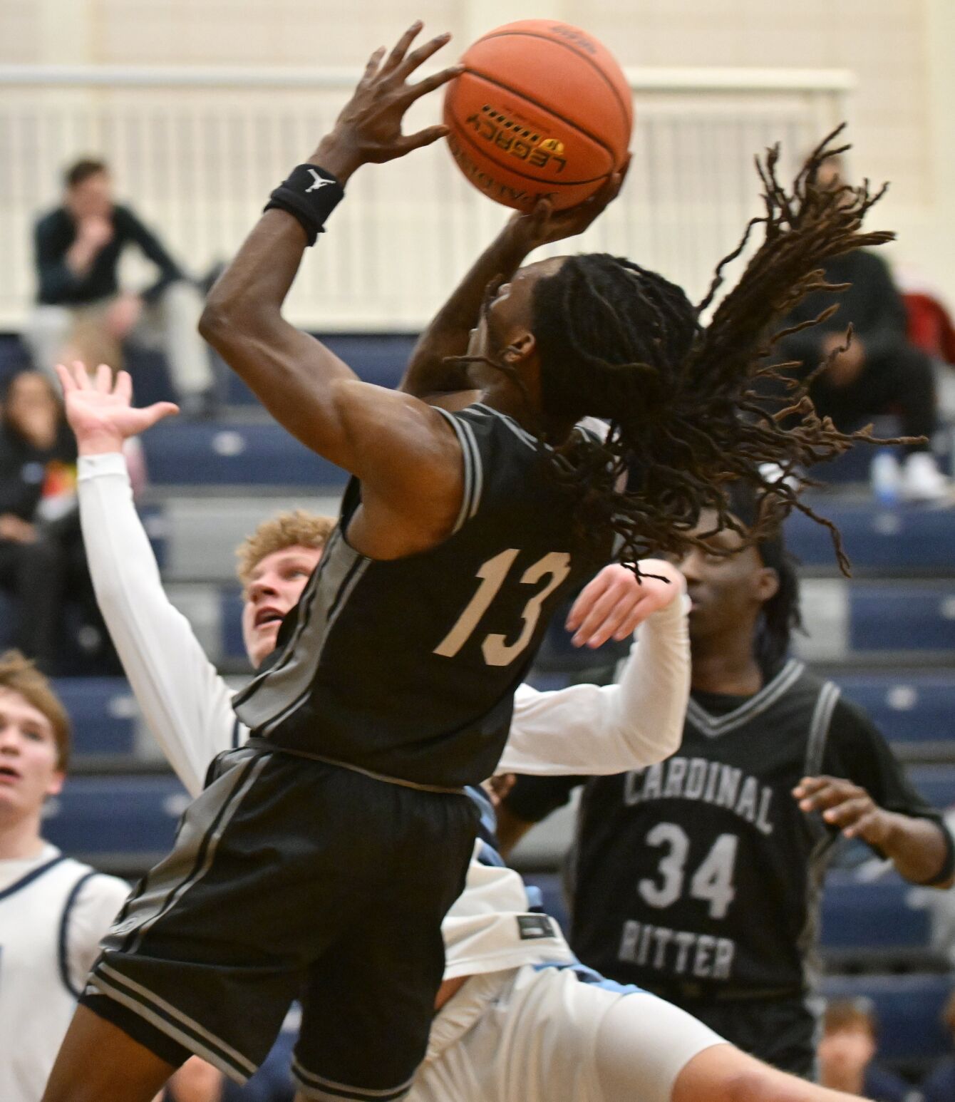 Class 6 District 1 boys basketball semifinal: Cardinal Ritter 55, SLUH 48