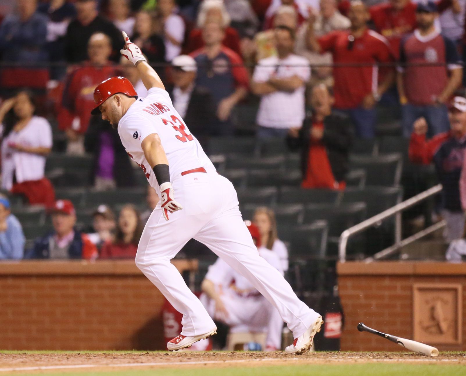 Cards win on Adams' single in 10th