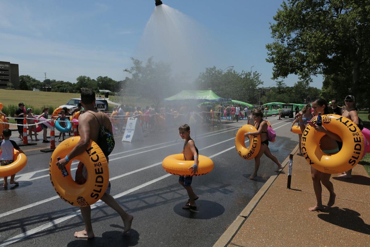 Slide the City turns Oakland Avenue into giant water slide | Metro ...