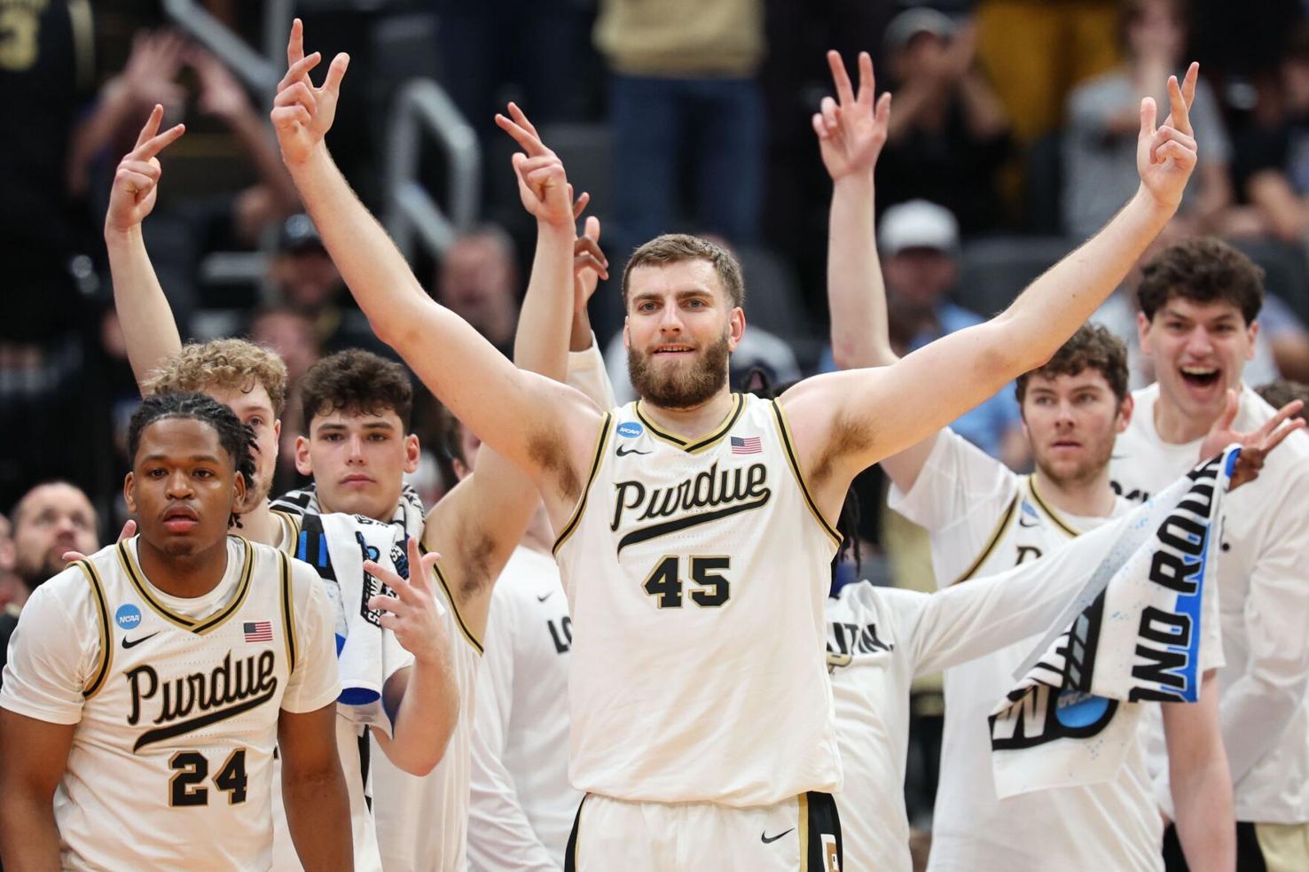Photos: Purdue wins 79-69 against Miami in NCAA March Madness at ...
