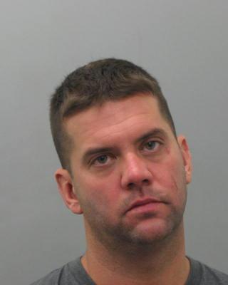 Ladue cop charged with domestic assault