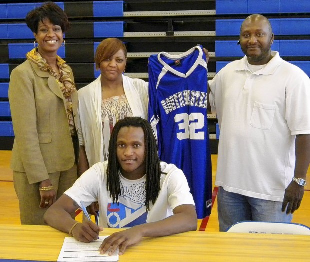 Student signs to go to SWIC