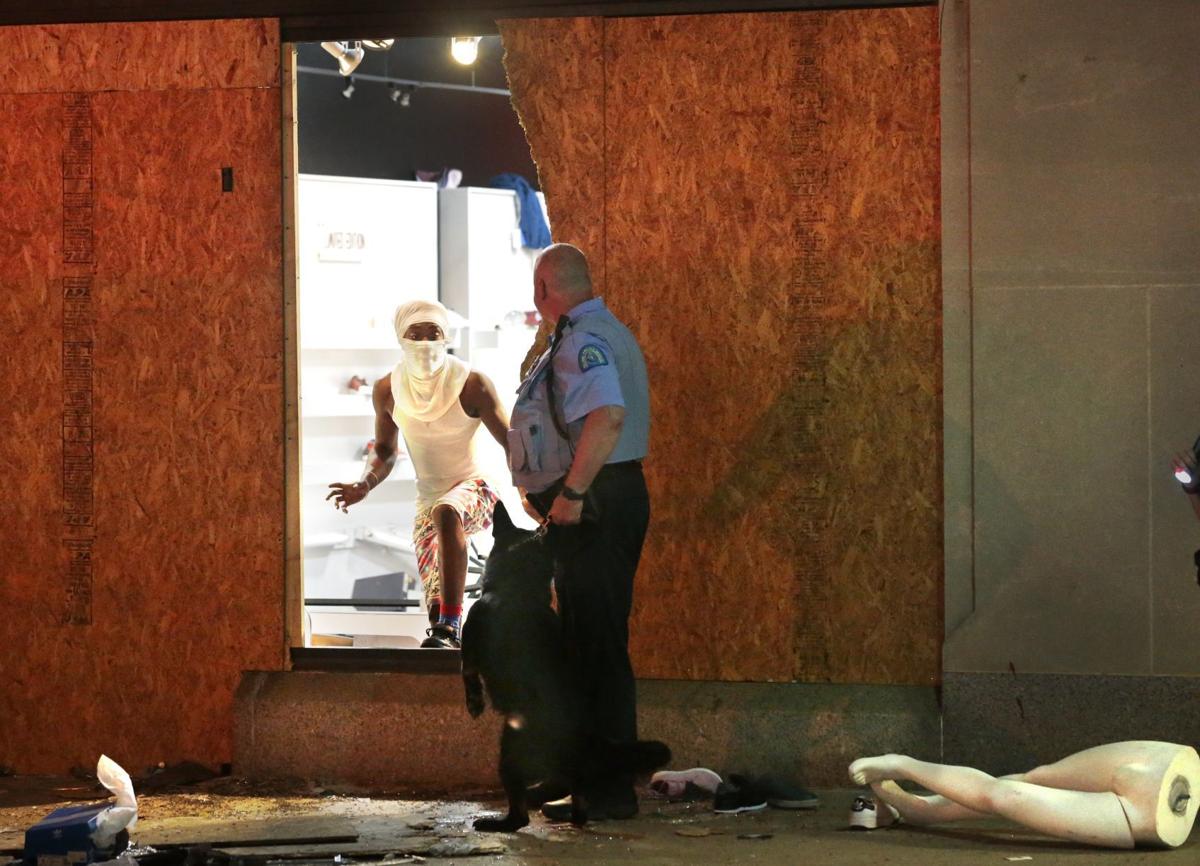 Photos: 4 Police officers shot, buildings looted, fires set in downtown ...