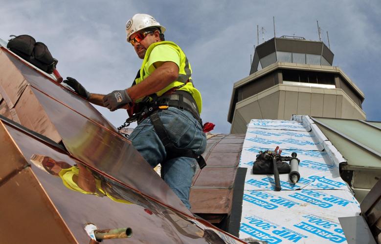 Main Lambert terminal gets shiny, new roof