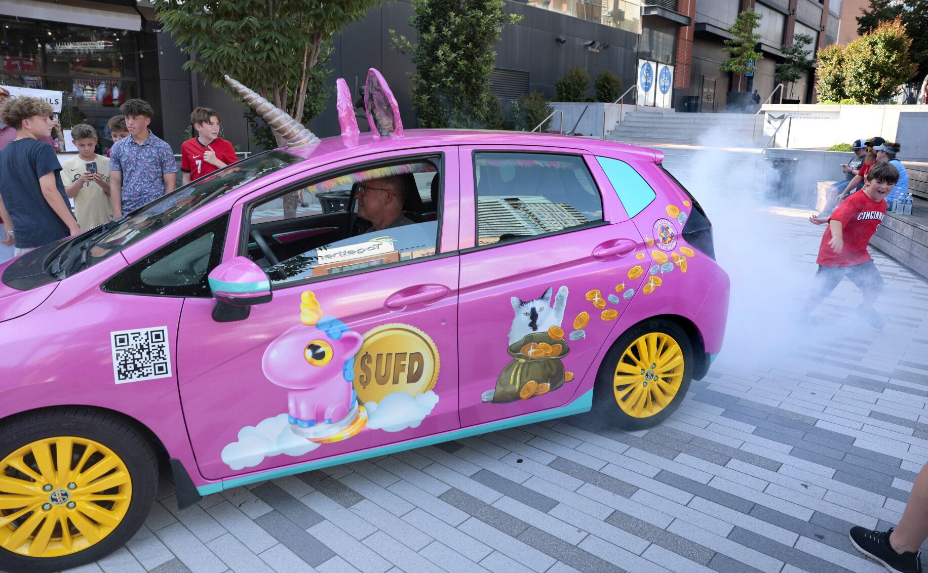 Pink farting unicorn car sets tone for meme-coin gathering