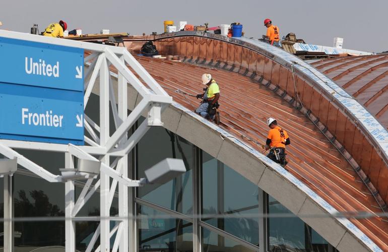 Main Lambert terminal gets shiny, new roof