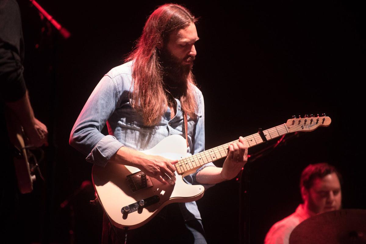 Call country artist Sam Lewis a 'singer-songwriter' at your own peril