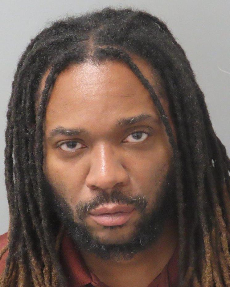 Man charged with killing St. Louis area campus cop in 2008