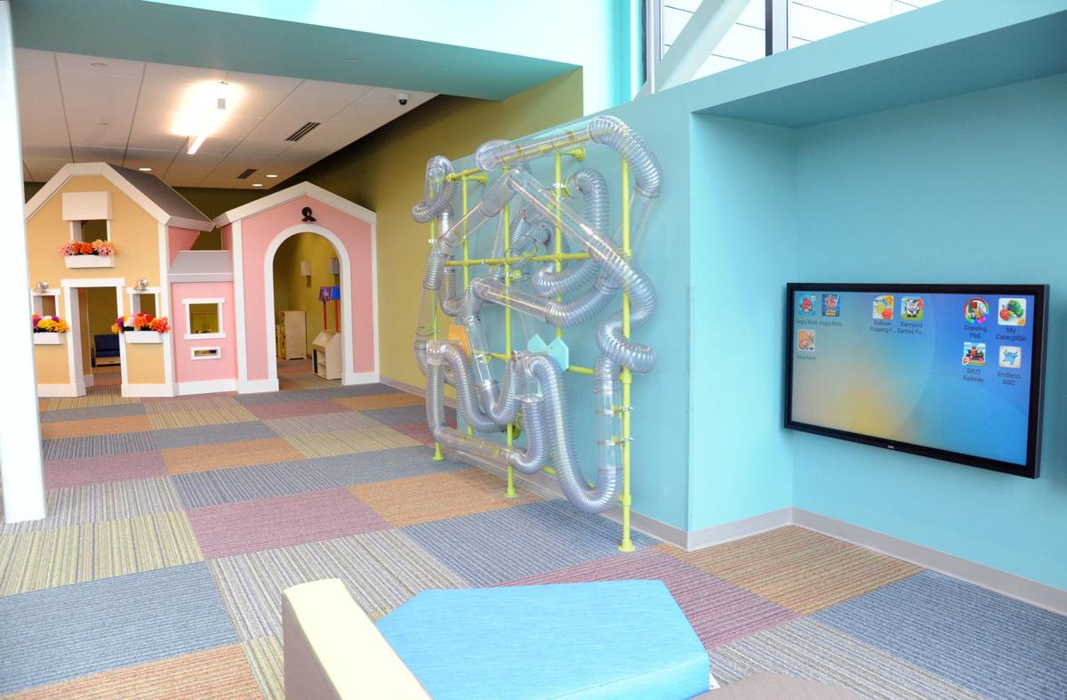 Fenton residents get to see their large, colorful new library on ...