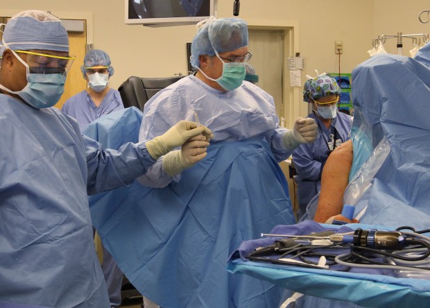 Paralyzed surgeon stands up for his patients