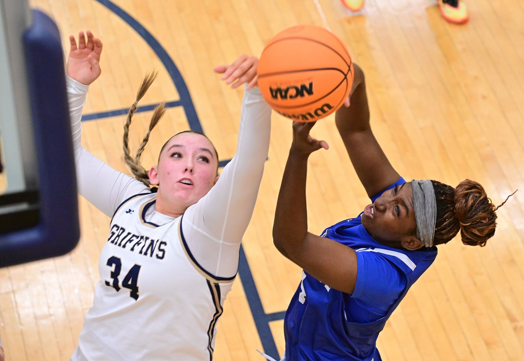 Father McGivney 53, Alton Marquette 24