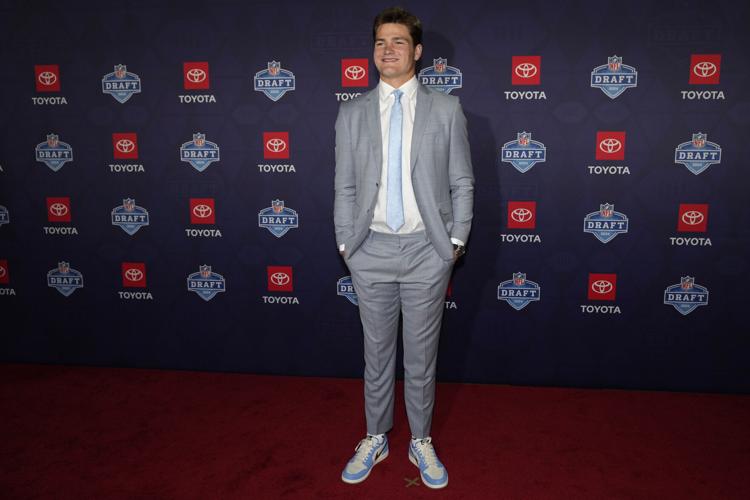 Custom suits take over red carpet at NFL draft events
