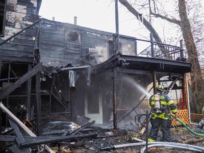 Man dies, elderly father injured in house fire in Ferguson Saturday