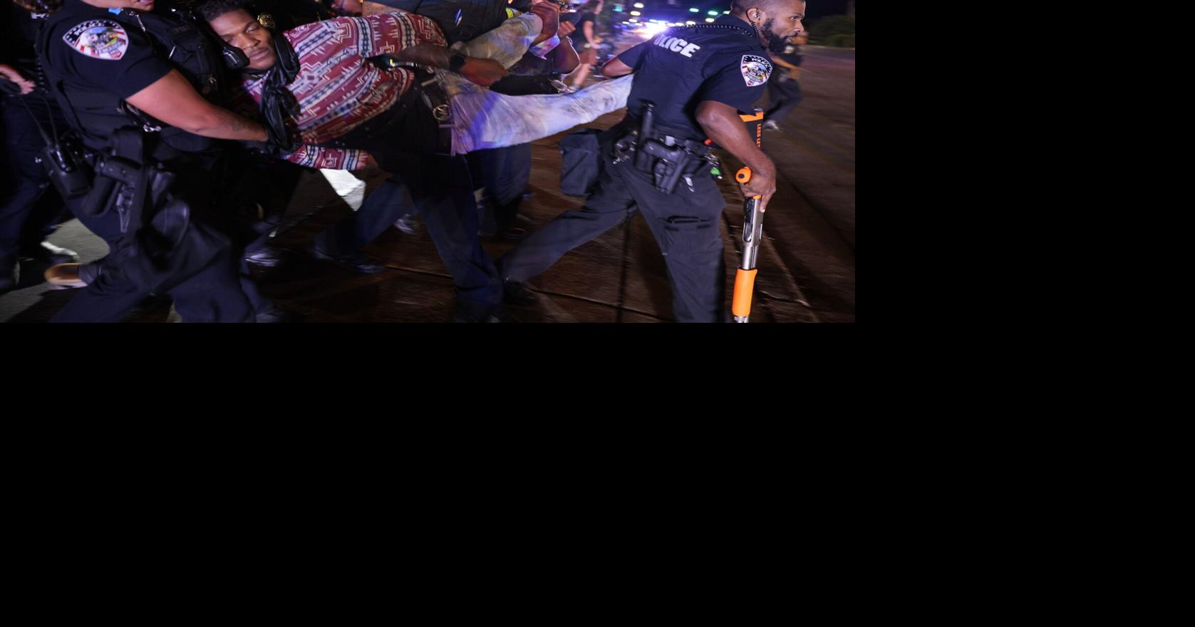 Protester didn't mean to hurt Ferguson officer, lawyer says