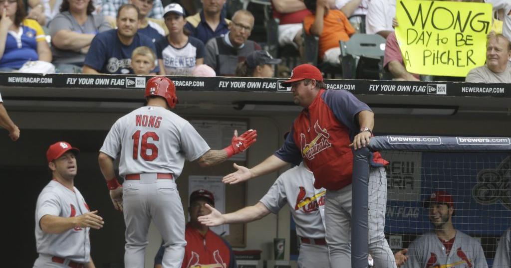 Cards' 10-2 win ties them for first