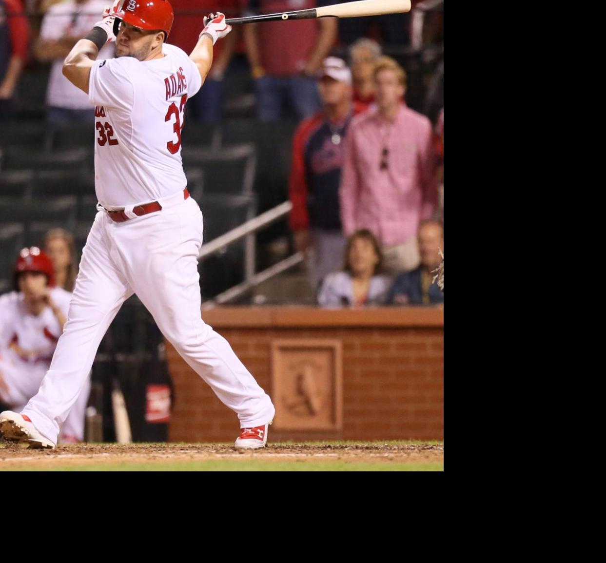 Cards win on Adams' single in 10th