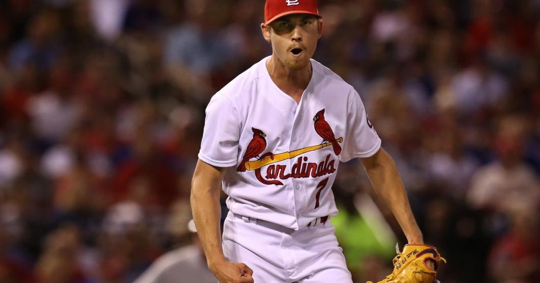Weaver finally beats Cubs, aided by timely hits from DeJong and Molina