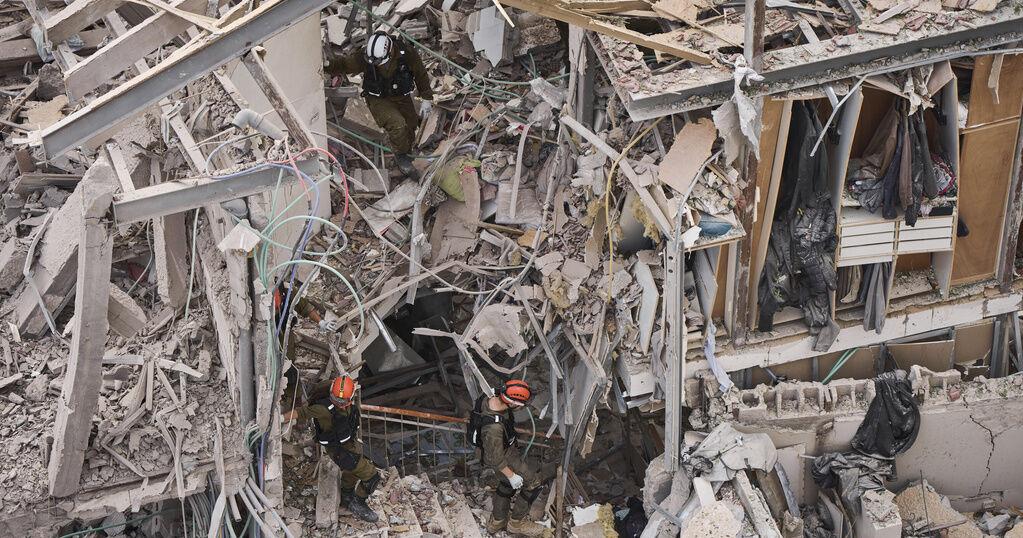 Photos show damage in Haifa and Tel Aviv after Iranian missile barrage