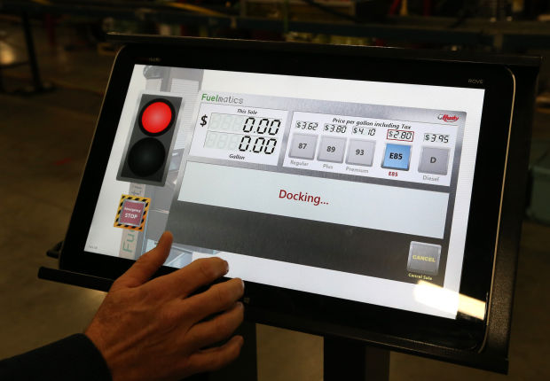 Robogas? Pacific company's robotic fuel pump fills the tank while you ...