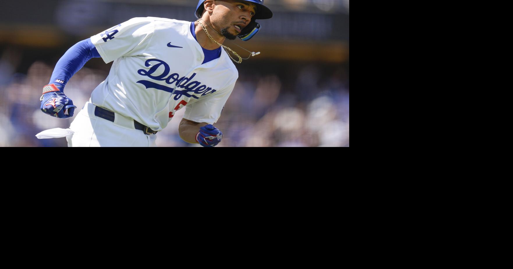 'Checkbook baseball' cashes in as Dodgers romp vs. Cardinals