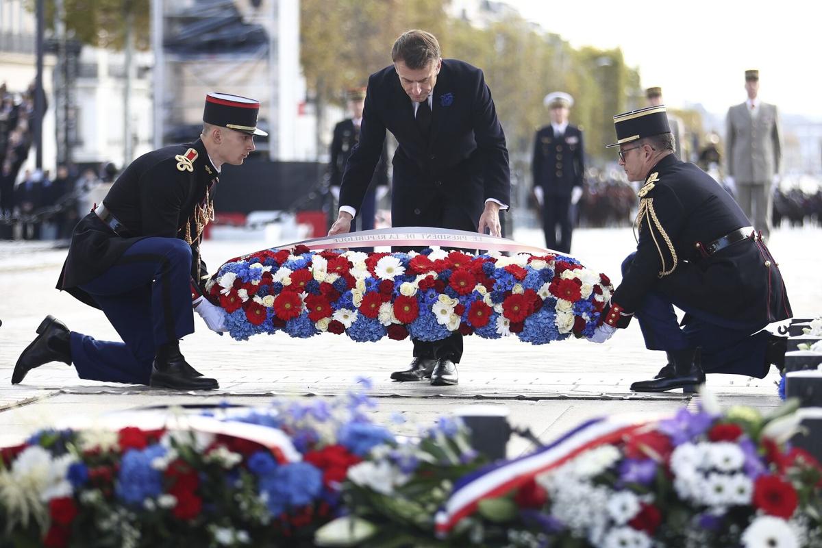 Somber bugles and bells mark Armistice Day around the globe as wars ...
