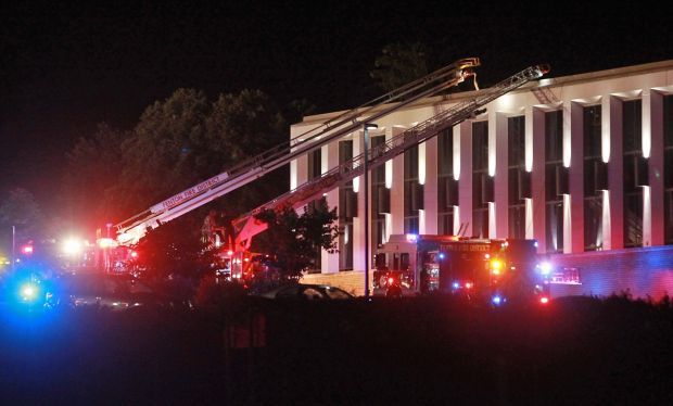 Firefighters douse smoldering fire on roof of building at Maritz Inc ...